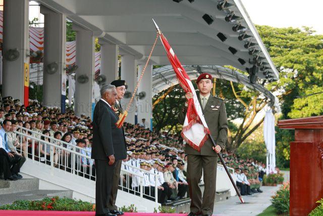 President S R Nathan presenting State Colours to Lieutenant