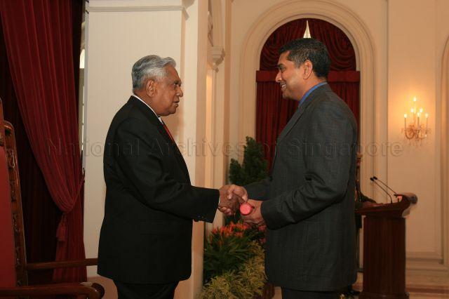 President S R Nathan presenting instrument of appointment to