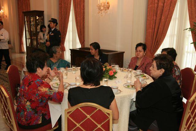 Mrs S R Nathan, wife of President, with guests at the