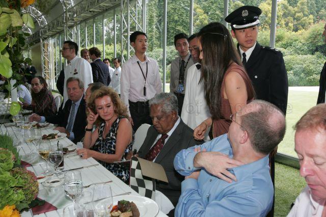 President S R Nathan signing autograph for guest during