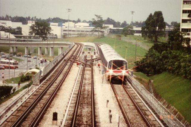 A SMRT (Singapore Mass Rapid Transit) train leaving Yio Chu