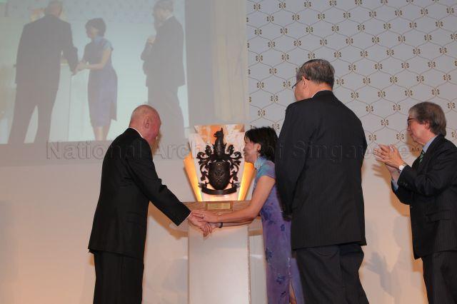 Minister Mentor Lee Kuan Yew being congratulated by