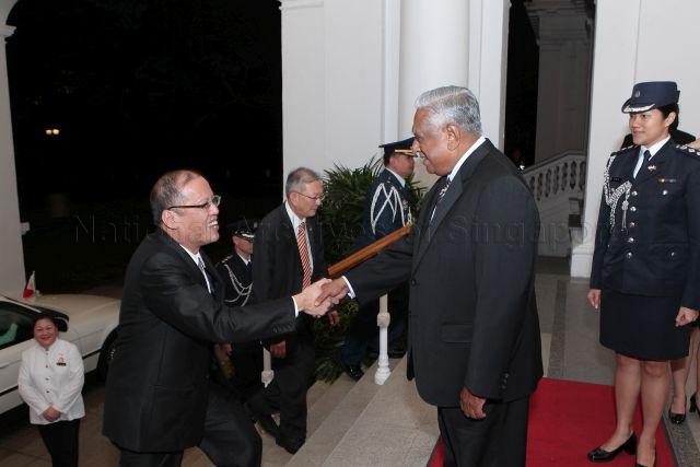 Philippine President Benigno S Aquino being greeted by