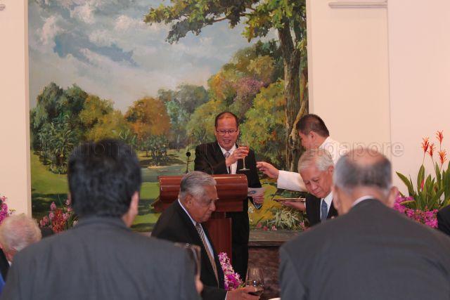 Philippine President Benigno S Aquino proposing a toast