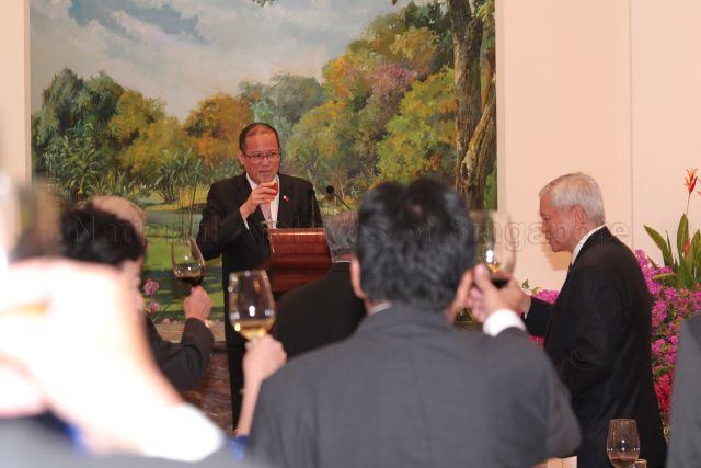 Philippine President Benigno S Aquino proposing a toast