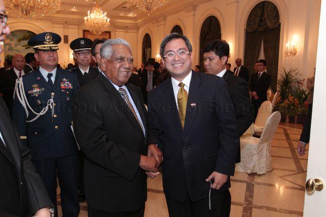 President S R Nathan posing for a photograph with guest