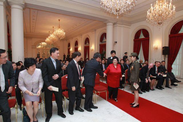 Mrs S R Nathan, wife of the President, being greeted by