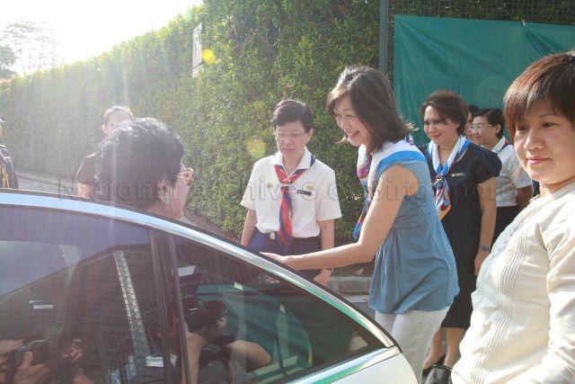 Mrs S R Nathan, wife of the President, being greeted by