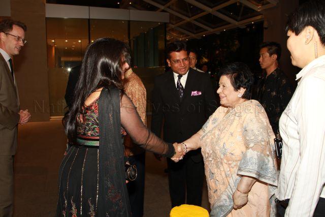 Mrs S R Nathan, wife of the President, being greeted upon
