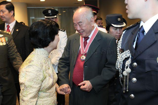 Mrs Mary Tan, wife of President Tony Tan Keng Yam, bidding