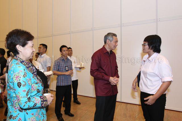 Prime Minister Lee Hsien Loong with Ms Tok Kheng Leng, a