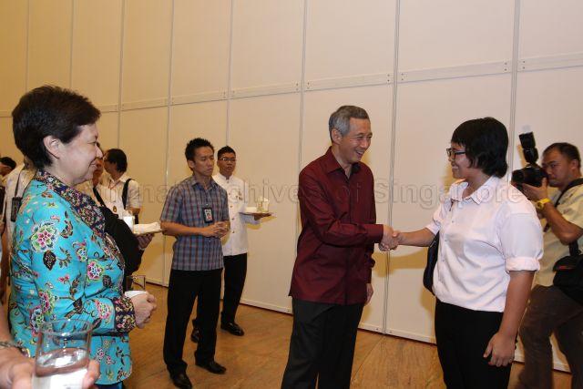 Prime Minister Lee Hsien Loong with Ms Tok Kheng Leng, a