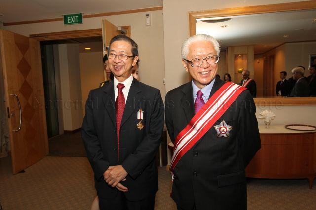 President Tony Tan Keng Yam with recipient of Meritorious