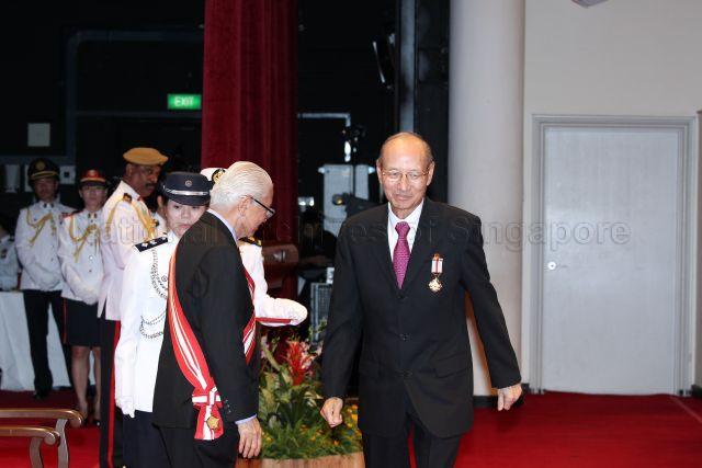 President Tony Tan Keng Yam and recipient of Meritorious