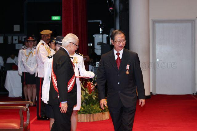 President Tony Tan Keng Yam and recipient of Meritorious