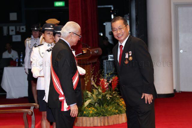 President Tony Tan Keng Yam and recipient of Meritorious