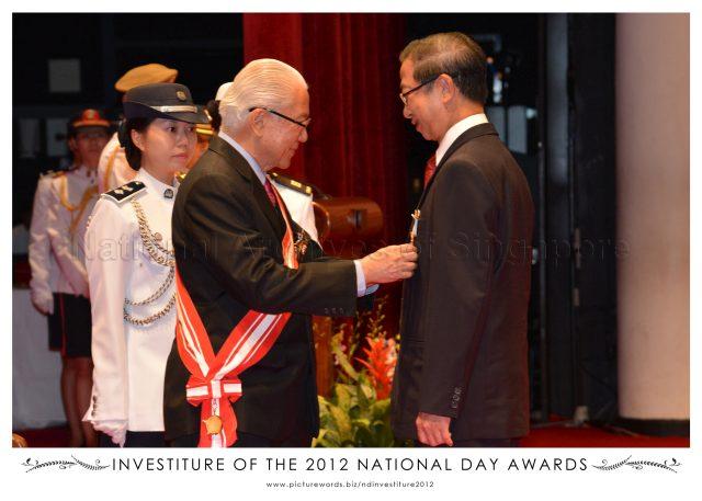 President Tony Tan Keng Yam presenting Meritorious Service