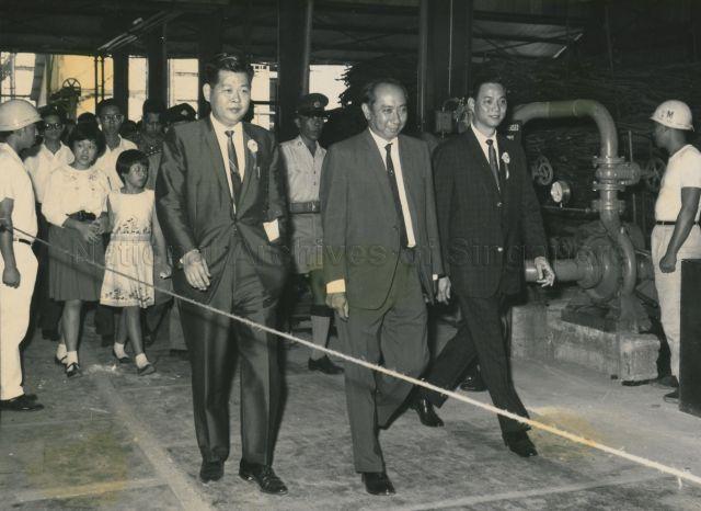 Minister of Finance Dr Goh Keng Swee, accompanied by