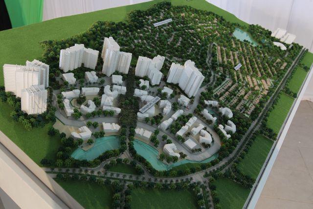 Architectural model at unveiling of two wellness-themed