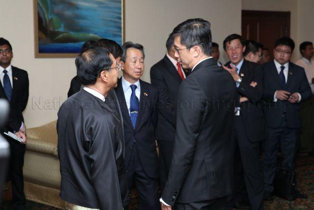 Chief Minister of Yangon He U Myint Swe (left) chatting with
