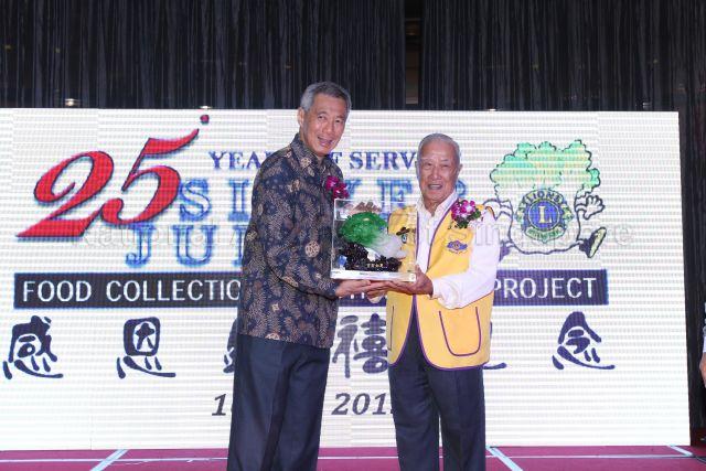 Prime Minister Lee Hsien Loong lauded Mr Looi Im Heok, PBM