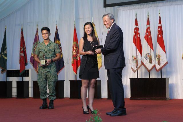 Minister for Defence Ng Eng Hen (right) presenting Singapore