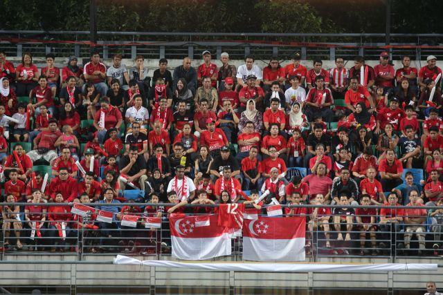 Football spectators during the match between LionsXII and