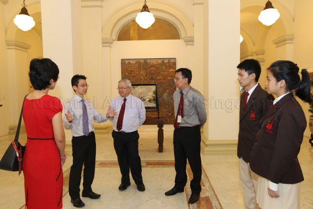 Management and students from Hwa Chong Institution waiting