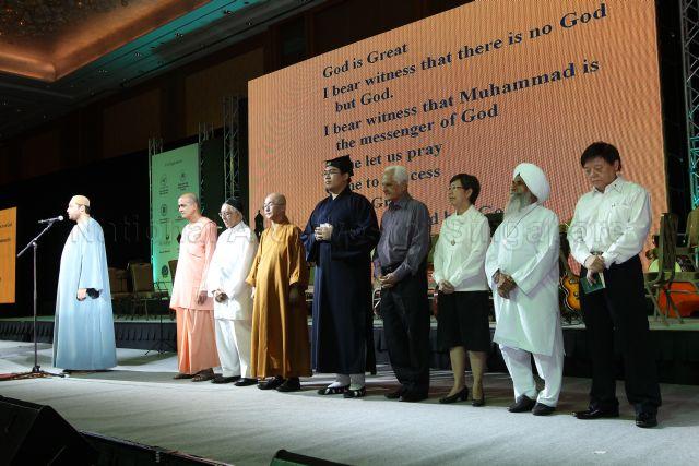 Leaders representing various religions on stage during Inter