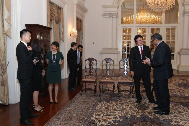 Chief Justice Sundaresh Menon (right) speaking to the newly