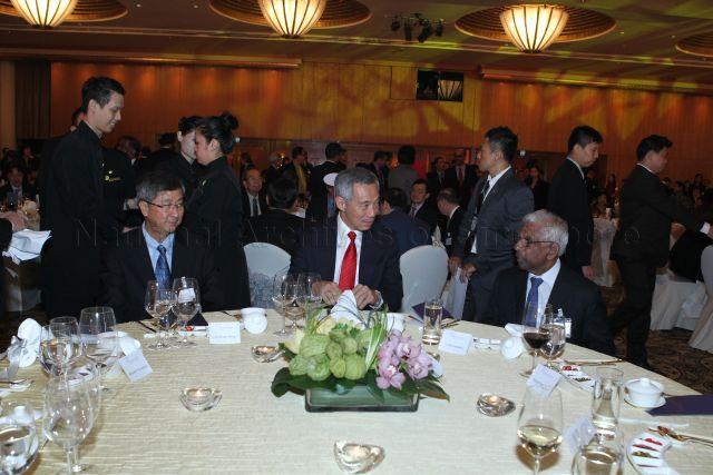 (From left to right) Temasek Holdings Chairman Lim Boon Heng