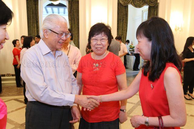 President Tony Tan is greeted by a guest at National Day
