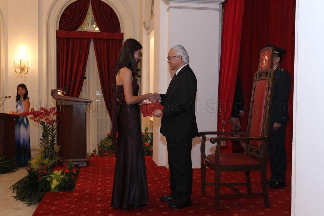 Stephanie Siow Su Lyn is receiving the President's