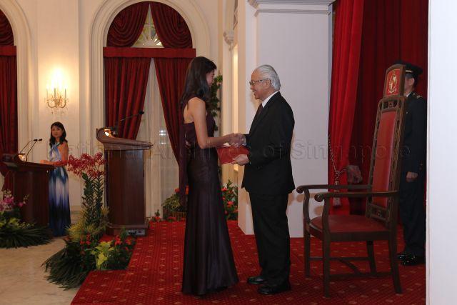 Stephanie Siow Su Lyn is receiving the President's