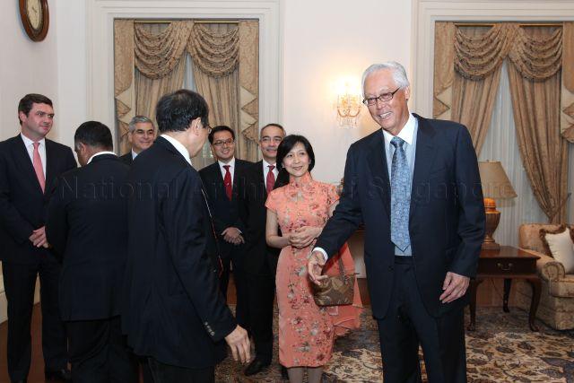 Emeritus Senior Minister Goh Chok Tong is greeting IHH