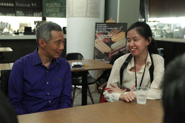 Prime Minister Lee Hsien Loong speaking to Dr Yeo Sze Ling,