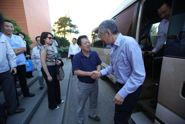 Prime Minister Lee Hsien Loong is arriving at Yuanda Group