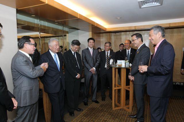 Prime Minister Lee Hsien Loong interacting with guests at
