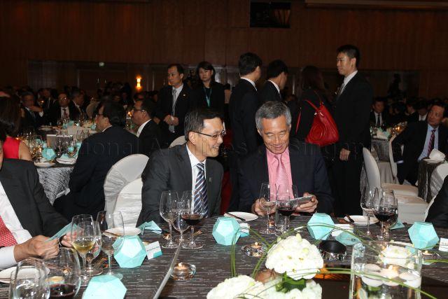Prime Minister Lee Hsien Loong seated at the VIP table