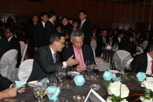 Prime Minister Lee Hsien Loong seated at the VIP table