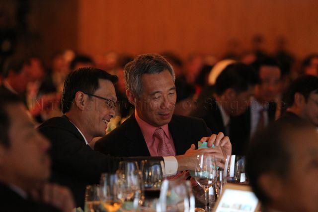 Prime Minister Lee Hsien Loong seated at the VIP table
