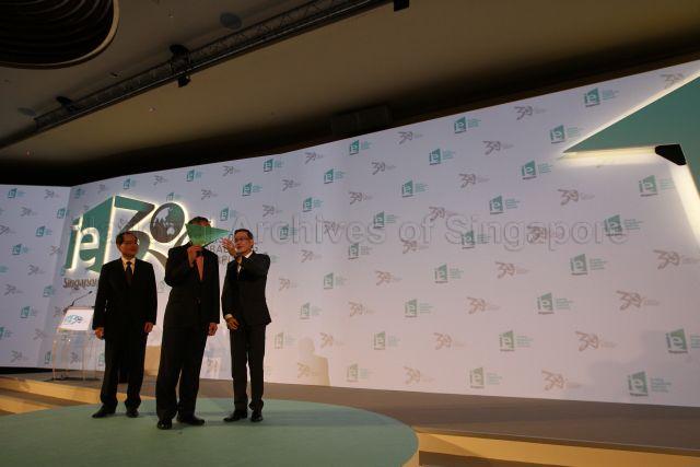 Prime Minister Lee Hsien Loong, (on the left) Minister for