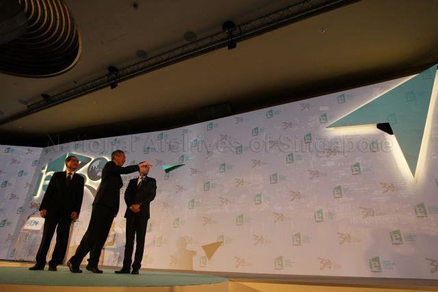 Prime Minister Lee Hsien Loong, (on the left) Minister for