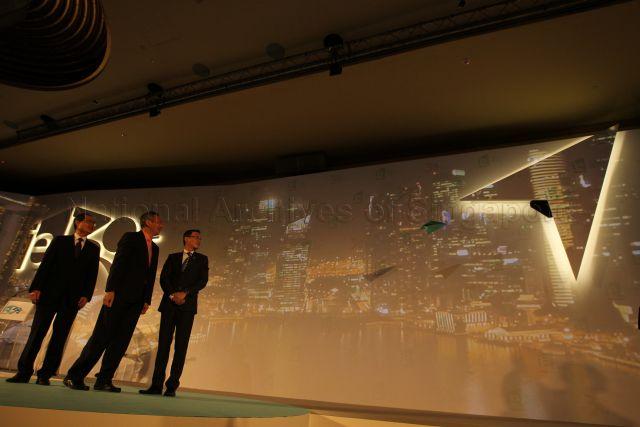 Prime Minister Lee Hsien Loong, (on the left) Minister for