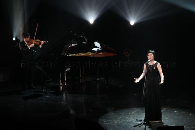 Justice Lai Siu Chiu performing at the Singapore Academy of