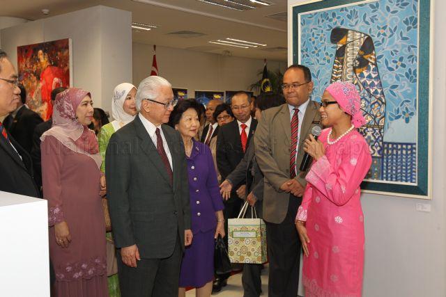 President Tony Tan and his wife Mrs Mary Tan being shown