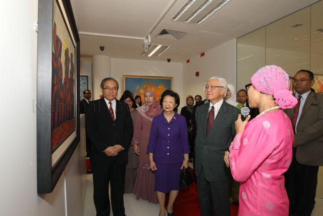 President Tony Tan and his wife Mrs Mary Tan being shown