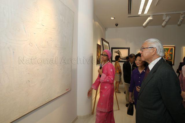 President Tony Tan and his wife Mrs Mary Tan looking at an