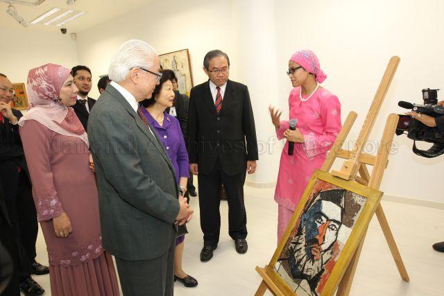 President Tony Tan and his wife Mrs Mary Tan looking at an