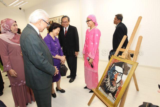 President Tony Tan and his wife Mrs Mary Tan looking at an